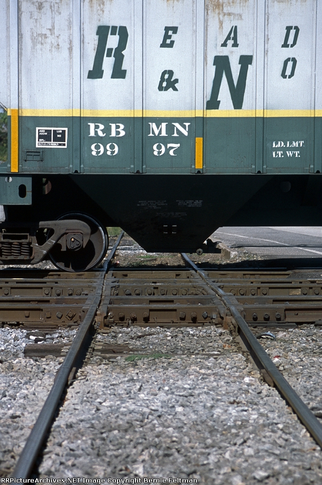 Reading, Blue Mountain & Northern #9997, crossing the former Seaboard Air Line at 32nd Street